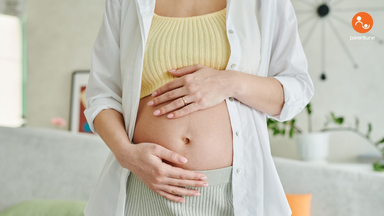 When Does Your Belly Start To Show? Baby Bump By Trimester Guide